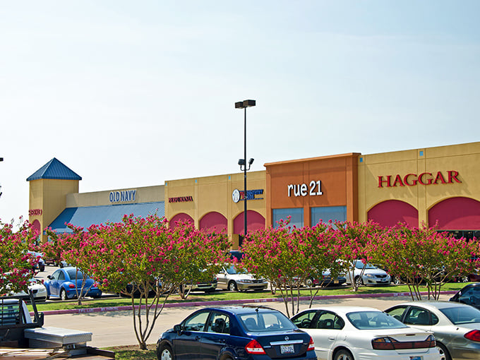 Those blooming crepe myrtles add Southern charm to serious shopping, proving that saving money can still feel gracious and beautiful.