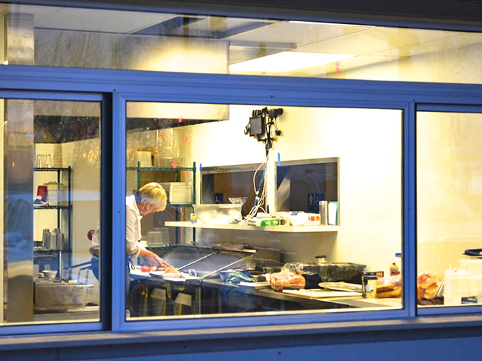 A glimpse into the kitchen—the smoke-filled laboratory where science and art collaborate to create edible joy.