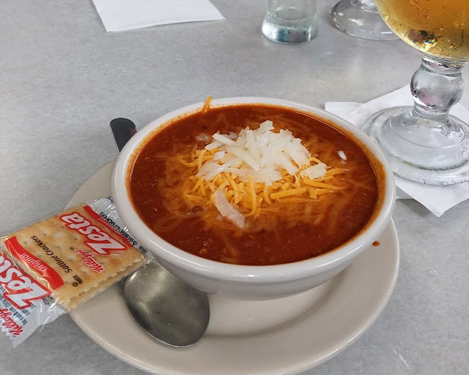 The 5-Alarm Chili topped with melted cheese arrives with crackers and a cold beer chaser&mdash;the perfect remedy for Indiana winter blues.