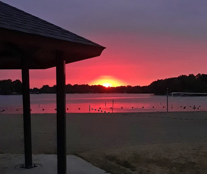 The sunset at Albert Lea City Beach paints the sky in colors so vivid, even your smartphone camera can't quite do them justice.