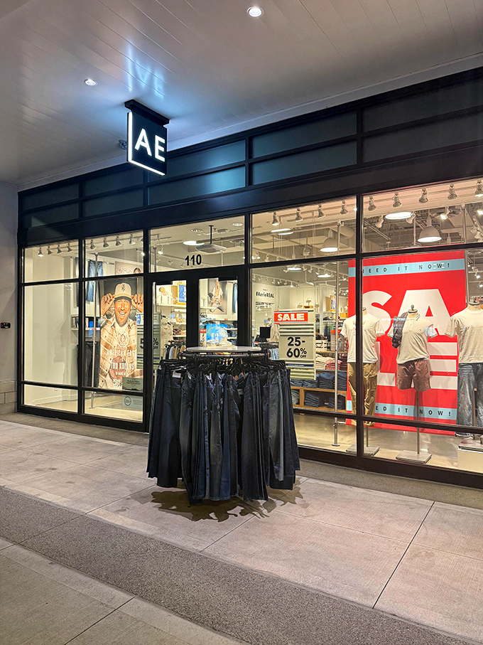 American Eagle's sleek storefront showcases current trends at yesterday's prices. That outdoor display rack is retail's version of a tempting appetizer.