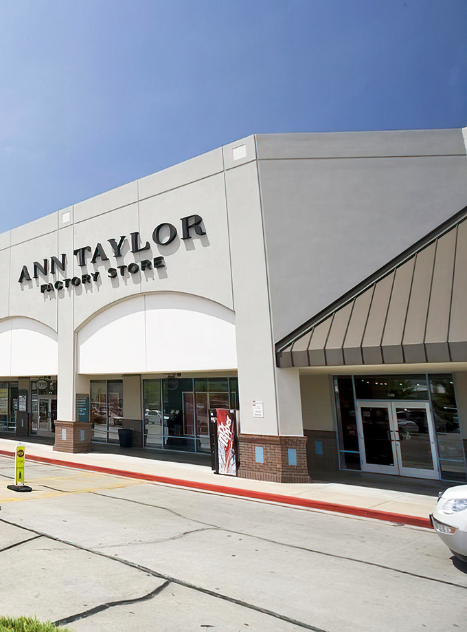 Ann Taylor Factory Store: where workwear meets wallet-friendly prices. That red curb isn't just for show&mdash;it's marking the boundary between full retail and sweet, sweet savings.