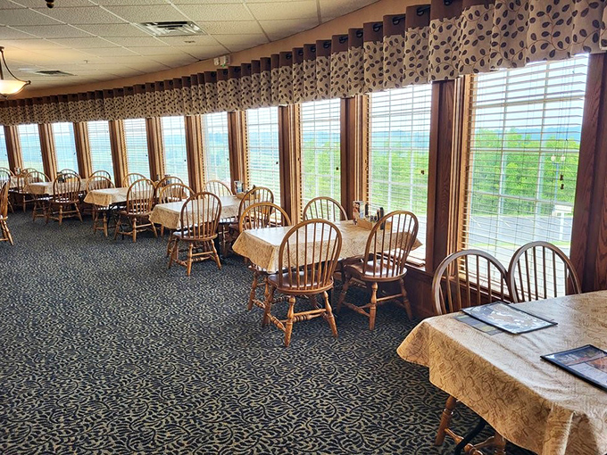 Window-side tables offer views of rolling Amish Country hills, proving that feasting for both stomach and eyes is the Der Dutchman way.