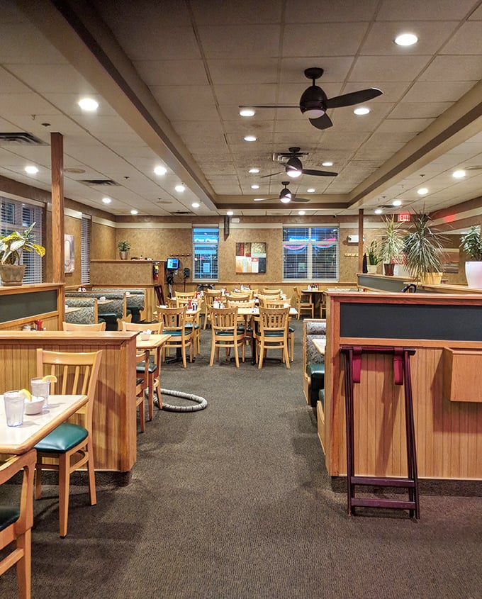 Wood paneling and comfortable booths create that classic diner coziness that's more comforting than your favorite sweater on a chilly morning.