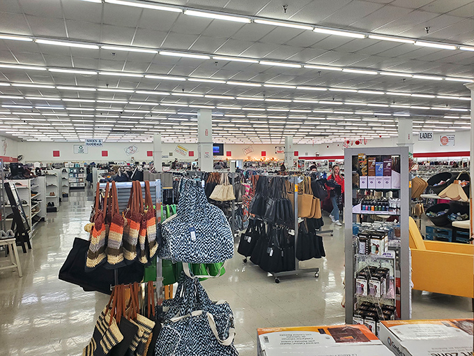 Handbags dangle like colorful fruit, ripe for the picking by savvy shoppers with an eye for yesterday's designer treasures.