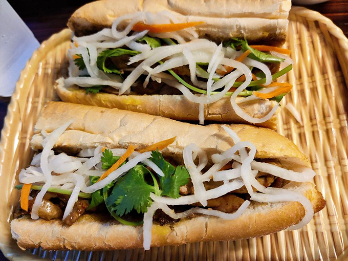 The humble b&aacute;nh m&igrave;&mdash;Vietnam's gift to sandwich architecture. Crispy bread, pickled vegetables, and savory fillings create the perfect handheld vacation for your taste buds.