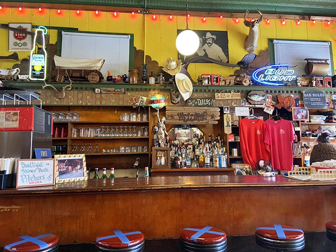 The bar doesn't just serve drinks&mdash;it serves history, with every bottle, sign, and cowboy hat telling stories of Fort Worth's colorful past.