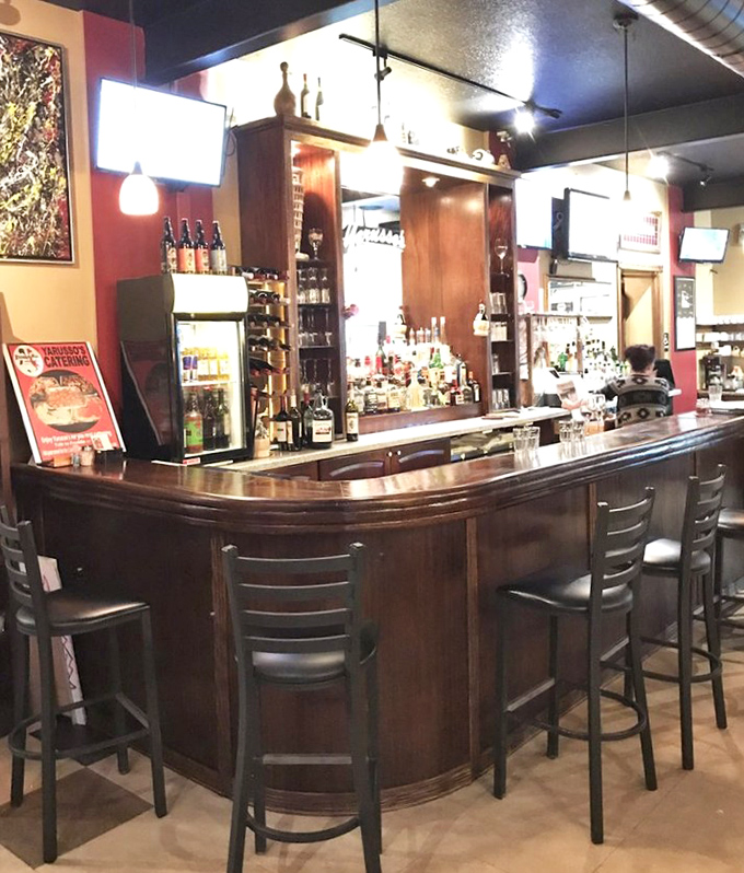 The bar stands ready to pour liquid courage for anyone attempting to finish their entire entr&eacute;e in one sitting.