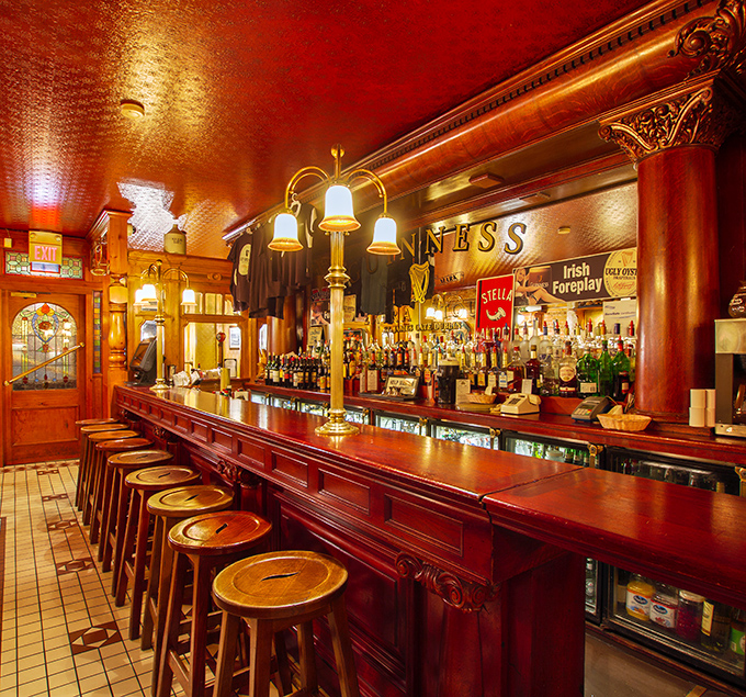 That gorgeous wooden bar stretches invitingly across the room, beckoning you to settle in for oysters and conversation.