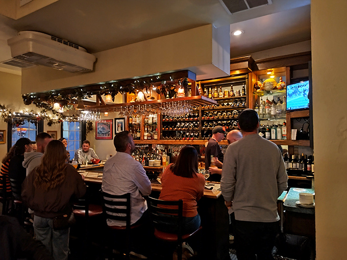The bar at Mama Carolla's isn't just serving drinks—it's serving community, conversation, and the kind of ambiance that makes you want to become a regular.
