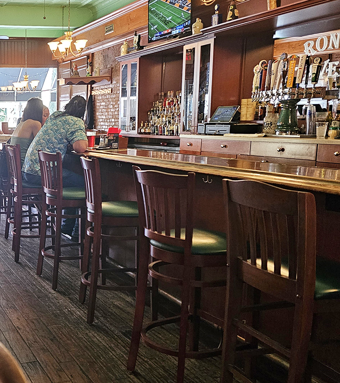 The bar area balances nostalgia with modern comforts. Those taps aren't just serving drinks&mdash;they're pouring community, one pint at a time.