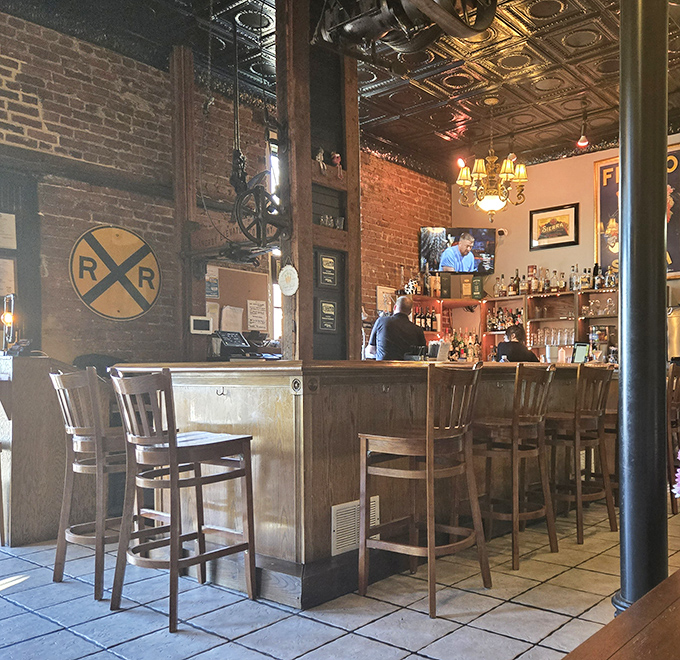 The bar area whispers, "Stay awhile and let's turn that after-dinner drink into a conversation that makes you forget what time it is."