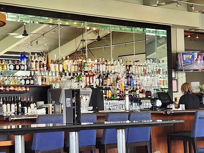 A bar stocked so comprehensively it looks like it could survive both apocalypse and prohibition while still serving a perfect Manhattan.