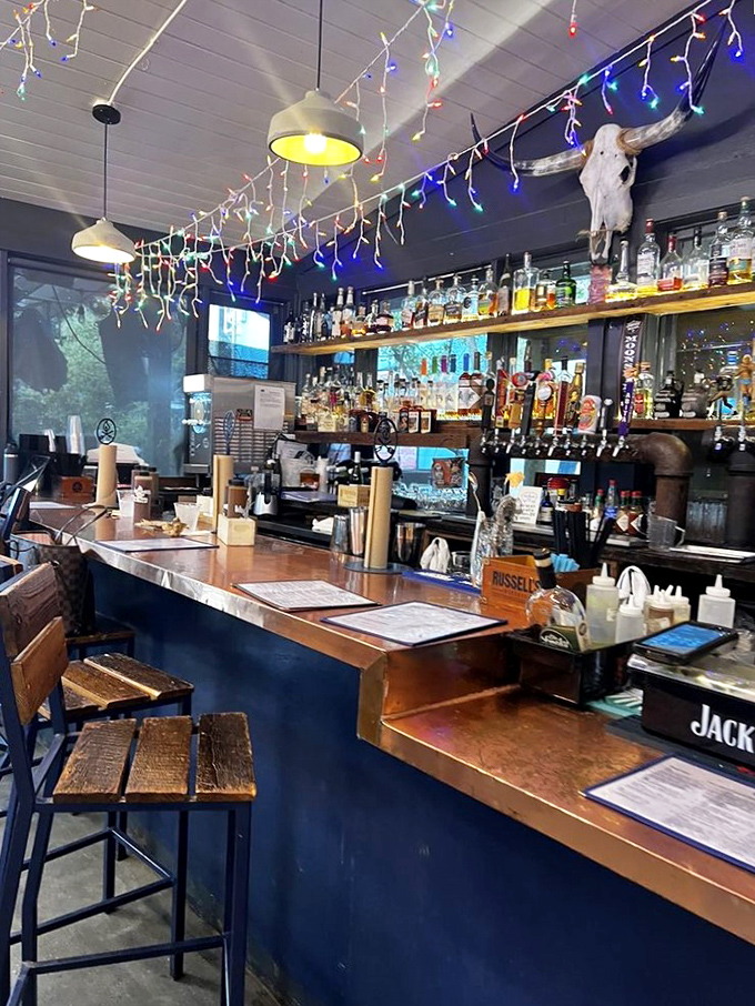 The bar isn't just serving drinks; it's offering liquid courage to order that extra side of brisket you're definitely going to want.