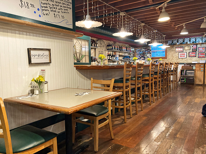 Counter seating offers front-row tickets to the breakfast theater. The best reality show in town happens right behind that pass-through window.