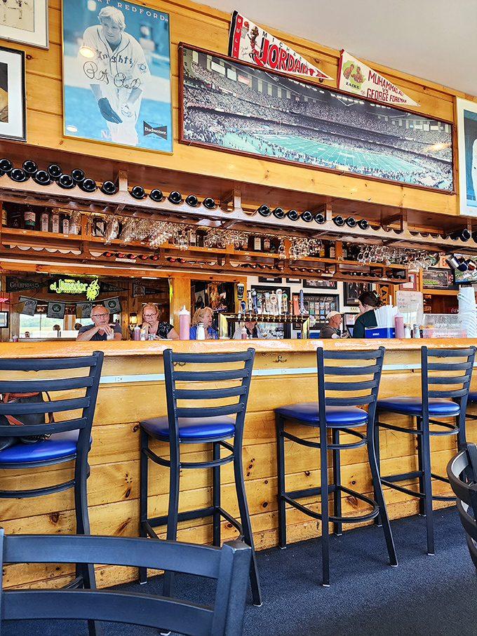 Pull up a blue chair at the bar where locals and visitors alike swap stories over cold drinks and hot seafood.