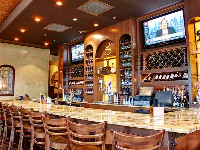 The bar's marble countertop and extensive wine collection suggest that while the food may be the headliner, the drinks deserve their own standing ovation.