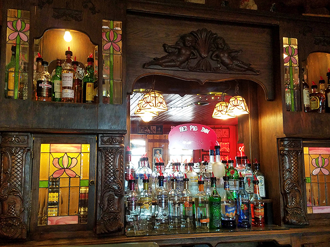 That ornate back bar display adds unexpected elegance, proving barbecue joints can have sophisticated taste in d&eacute;cor too.