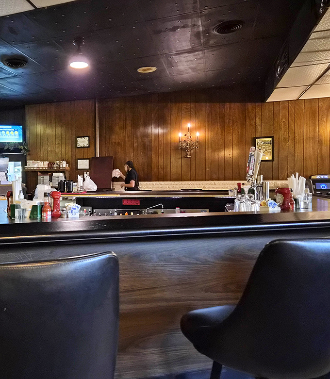 The bar's warm wood tones and classic setup say everything about Emil's philosophy: focus on what matters and don't mess with perfection.