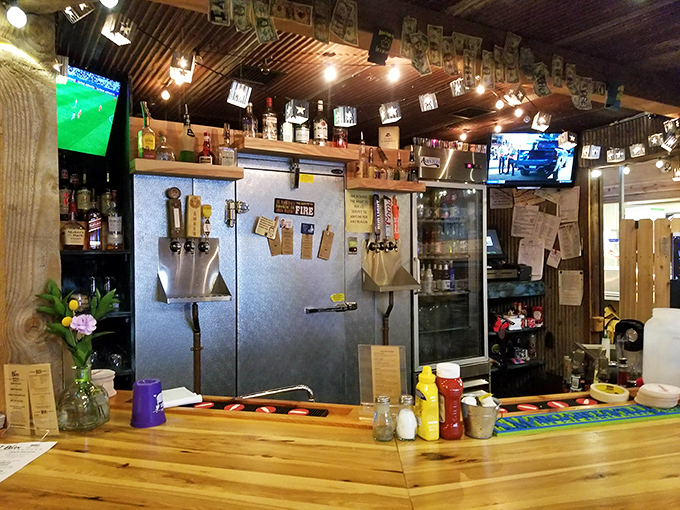 The bar's wooden countertop has probably heard more Kansas stories than any therapist in the state. Those condiments aren't decorative&mdash;they're essential.