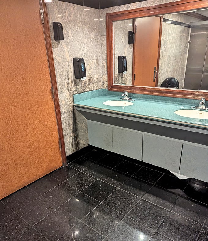 Even the bathroom maintains that classic diner aesthetic &ndash; mint countertops and clean lines that say "we care about the details."