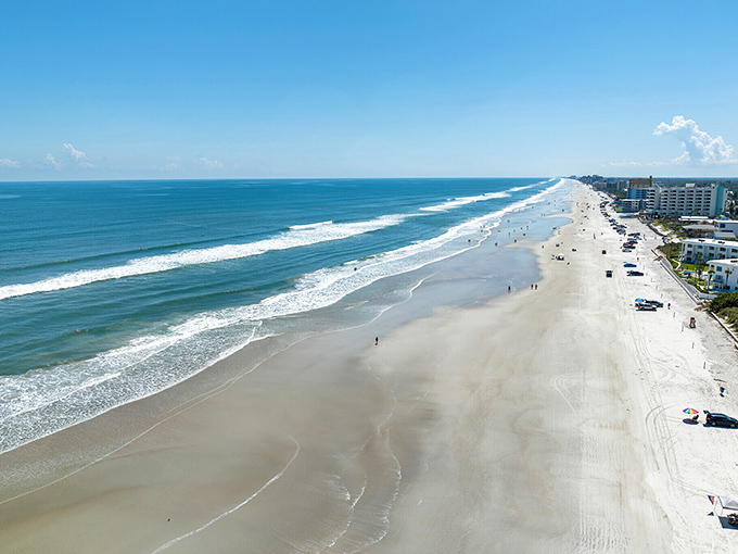 Miles of pristine shoreline where the Atlantic meets hard-packed sand, creating nature's perfect jogging track that forgives aging knees.
