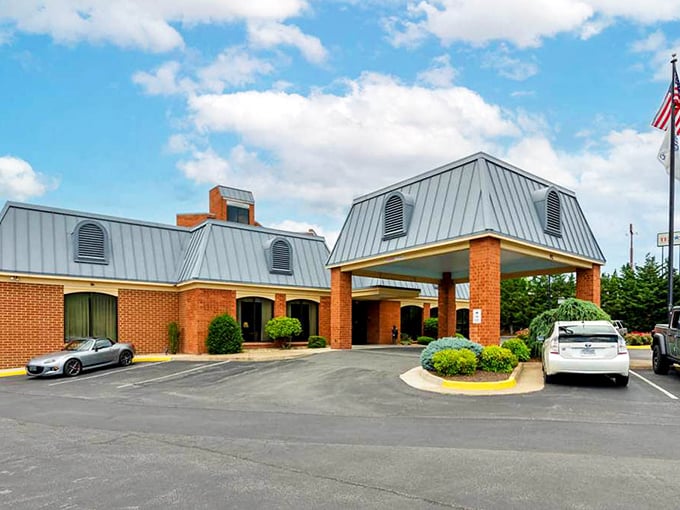 The Best Western's mansard roof and brick facade say "we respect Staunton's architectural heritage" while the parking lot whispers "but we have modern amenities."