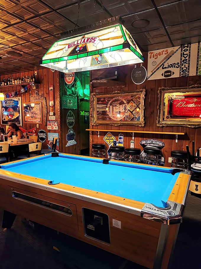 The billiards table—where friendly rivalries are born and settled between bites of whitefish and sips of Michigan craft beer.