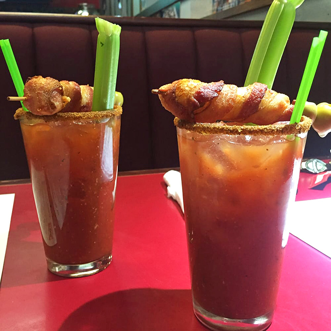 Bloody Marys garnished with bacon&mdash;because sometimes vegetables alone aren't enough to justify drinking tomato juice before noon.