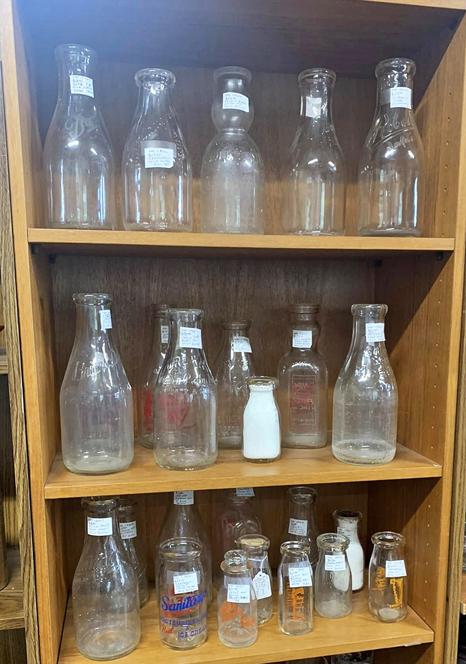 These glass bottles once delivered milk to doorsteps and soda to eager hands, now collected like transparent time capsules.