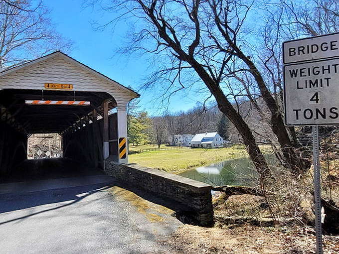 The weight limit sign reminds us this is still a working bridge, not just a historical curiosity frozen in time.