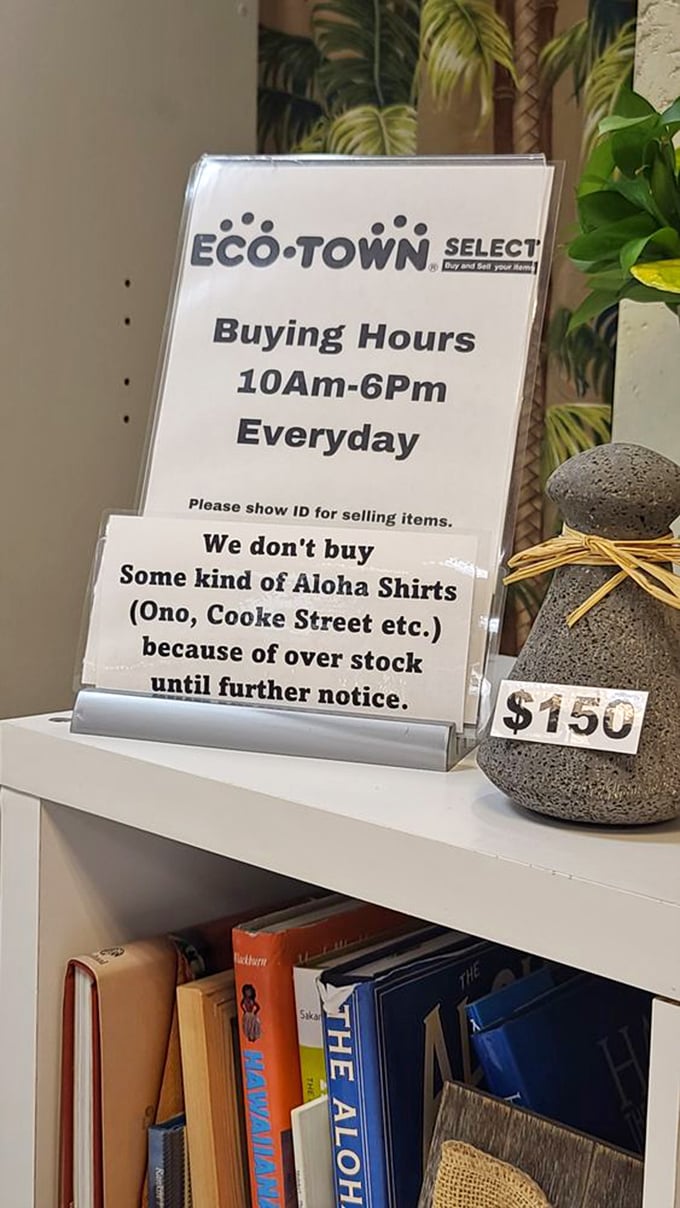 Even their signage has personality. Note the "overstock" of aloha shirts&mdash;a uniquely Hawaiian problem worth smiling about.