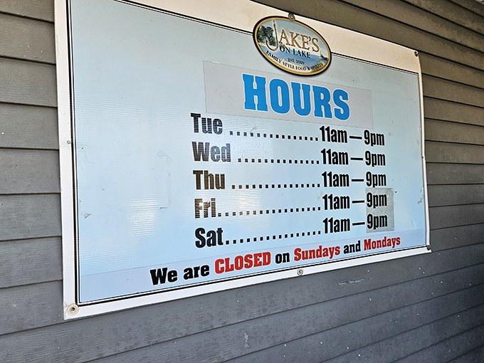 Business hours posted clearly&mdash;because knowing when you can get your next walleye fix is essential information.