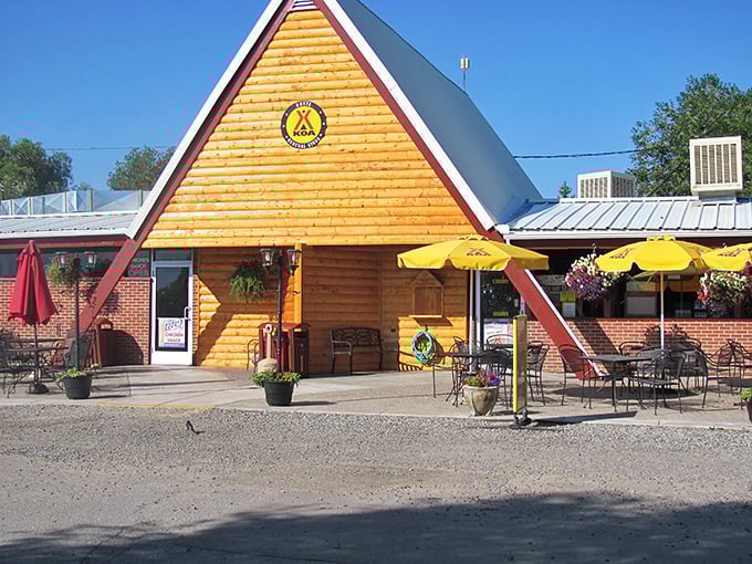 Butte's A-frame establishments offer cozy retreats where yellow umbrellas invite lingering conversations over coffee&mdash;retirement's simple pleasures in concentrated form.