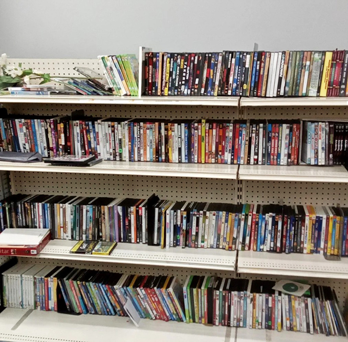 The DVD shelves: a physical Netflix of forgotten favorites and cult classics waiting to entertain on your next rainy weekend.