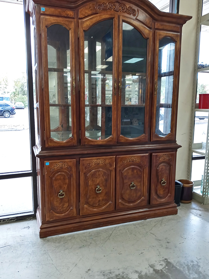 This ornate china cabinet has seen things&mdash;dinner parties, holiday gatherings, and now, it awaits a new family to impress.