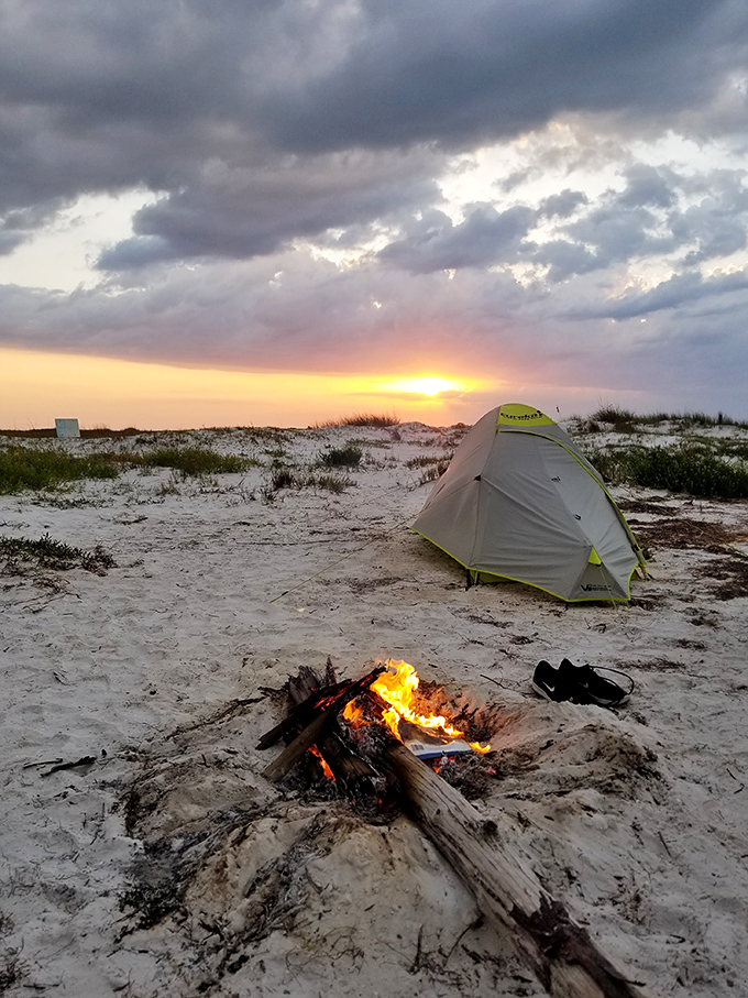 Camping goals defined: tent, campfire, sunset, and not another soul in sight. This is social distancing Florida-style.