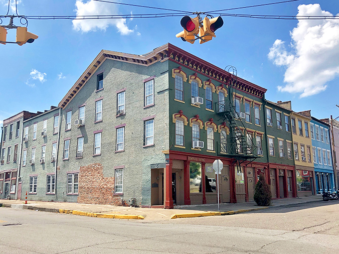 The Central Hotel's colorful façade brings a European sensibility to Main Street, proving historic preservation can be both respectful and playful.