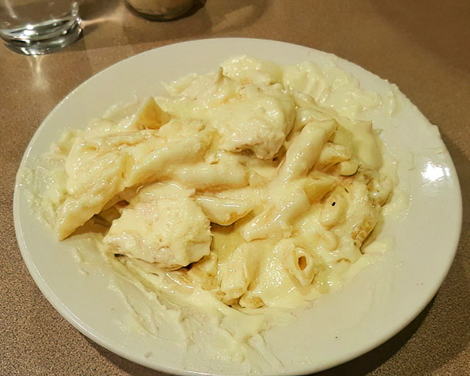 Chicken Alfredo that doesn't skimp on either component&mdash;the pasta swimming happily in a sauce that remembers when cream and butter weren't villains.