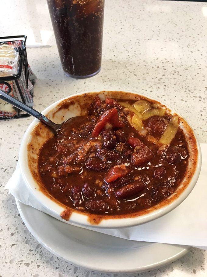A bowl of chili that could convert vegetarians and warm even the coldest Alaskan day. Spoon-standing thickness is no exaggeration here.