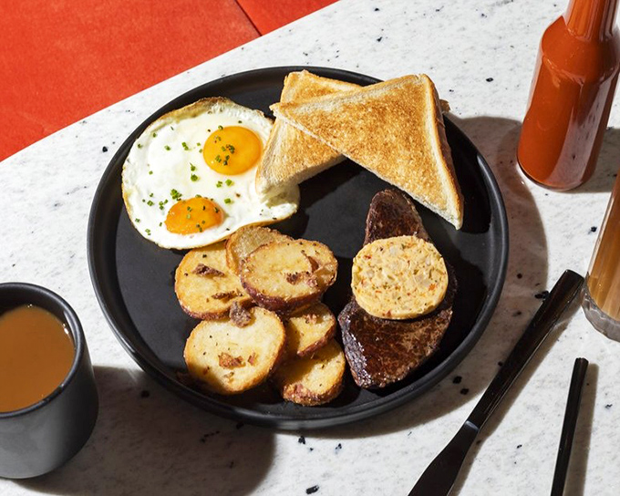 The classic breakfast plate&mdash;where sunny-side-up eggs meet golden home fries and toast in perfect harmony. Simplicity that sings.