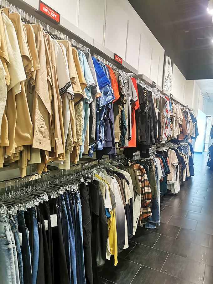 Racks on racks on racks&mdash;where 60% off signs transform "just browsing" into "I'll take three" faster than you can say "credit card."