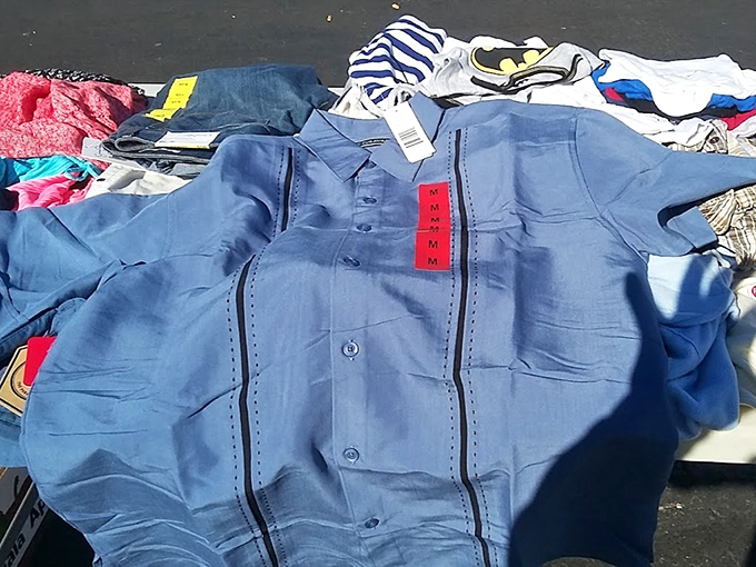 Brand new with tags&mdash;the holy grail of flea market clothing finds. This blue button-up is ready for its second chance at a first impression.