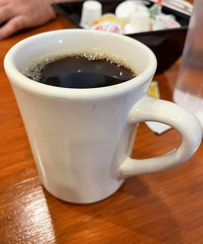 Simple, hot, strong coffee in a classic white mug&mdash;sometimes the best things don't need elaborate descriptions or foam art.
