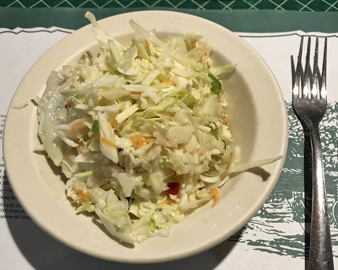 Coleslaw that knows its role &ndash; providing the perfect crisp, tangy counterpoint to the richness of fried chicken and hearty sides. 