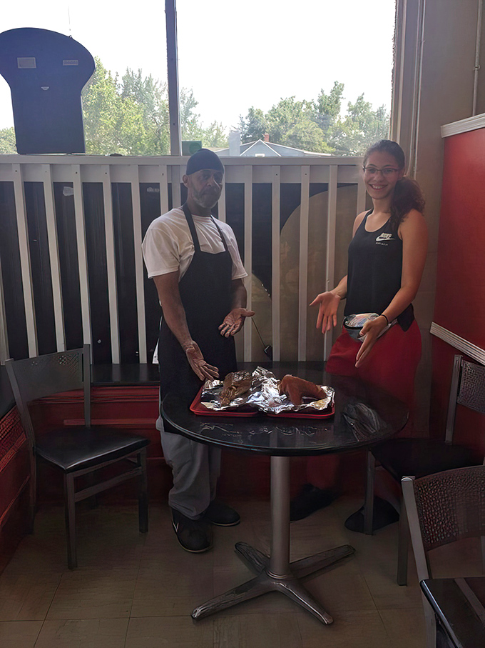 The heart and soul of Fish And More: dedicated staff preparing food with care that you can taste in every bite.