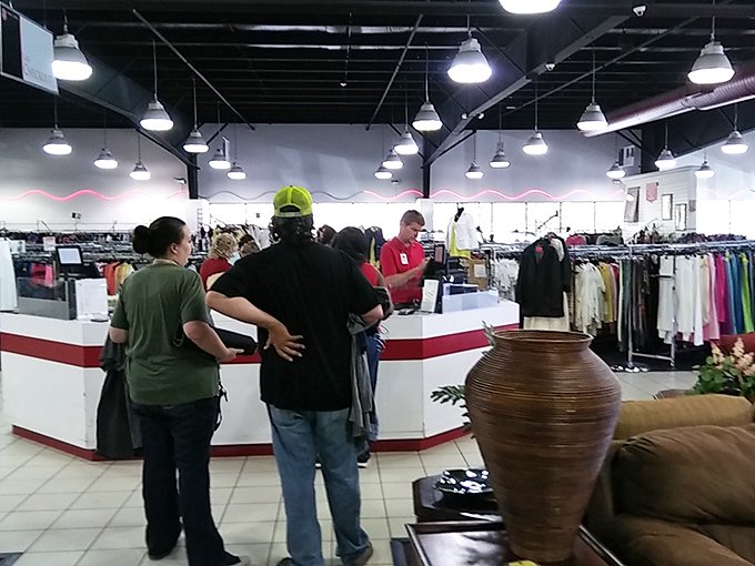 The checkout counter where bargain hunters emerge victorious, arms full of finds they didn't know they needed.