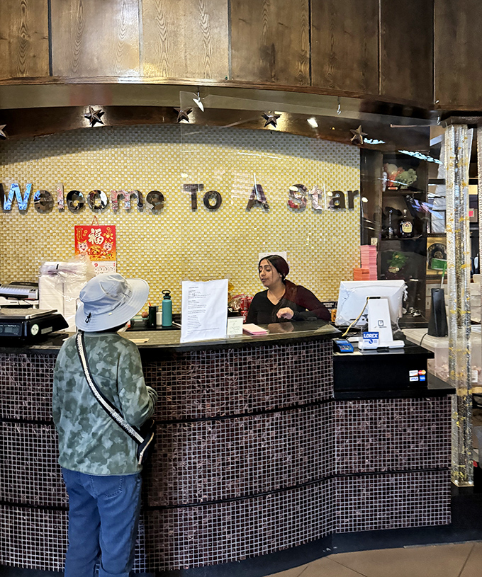The welcome counter, where your seafood journey begins and your diet officially takes a vacation.