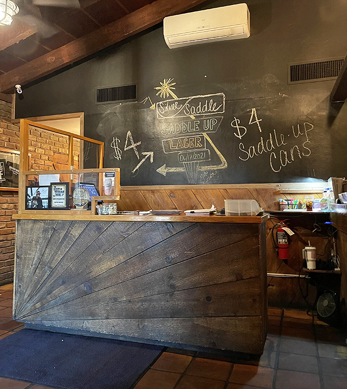 The rustic wooden counter and chalkboard specials remind you that sometimes the best dining experiences come without digital menus or QR codes.