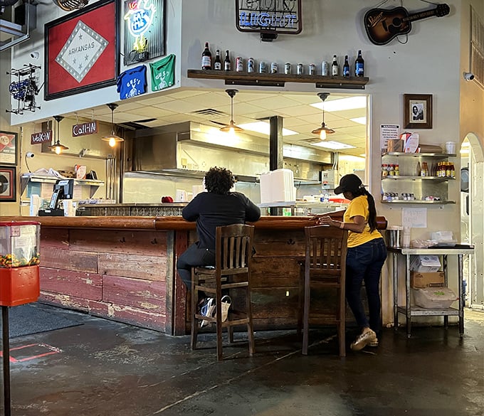 The counter where magic happens. Like watching backstage at a concert, you can almost hear the sizzle of chicken meeting hot oil just beyond.